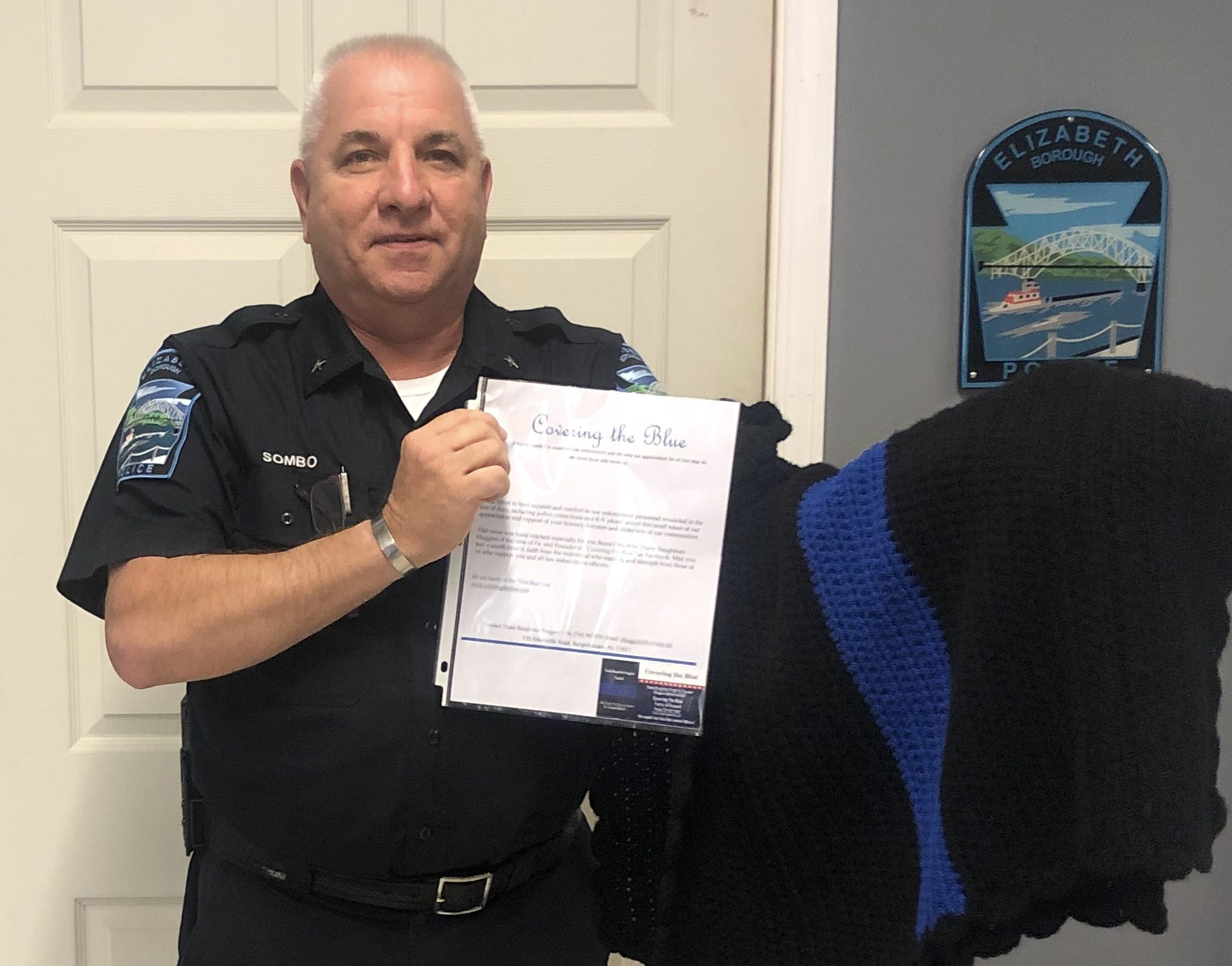 Three Elizabeth officers receive afghans from online group - Mon Valley ...