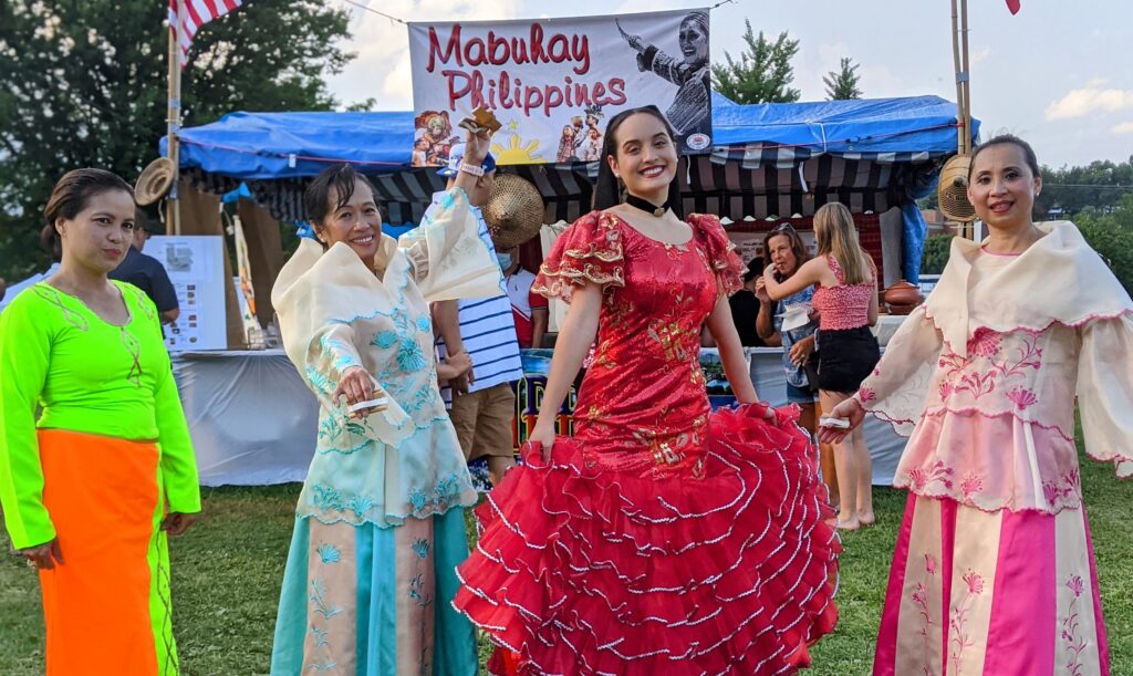 International Village: Filipino performers return to stage after 18 ...