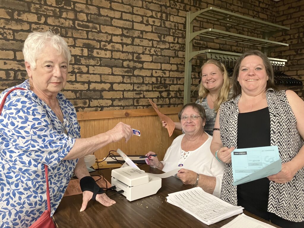 Poll workers dedicate long hours – and many years – for elections - Mon ...