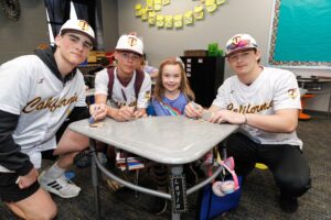 Trojans players hold autograph session - Mon Valley Independent
