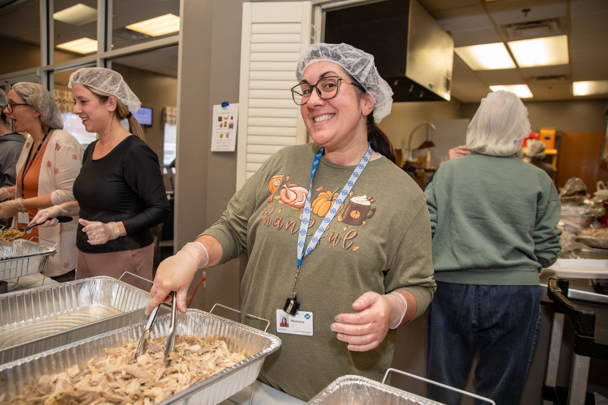 More than a meal: SPHS community outreach volunteers serve food, smiles ...
