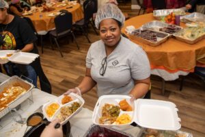 More than a meal: SPHS community outreach volunteers serve food, smiles ...